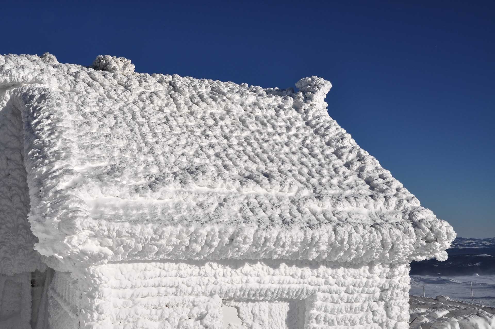How Snow and Ice Impact Your Roof - Hart Roofing & Construction